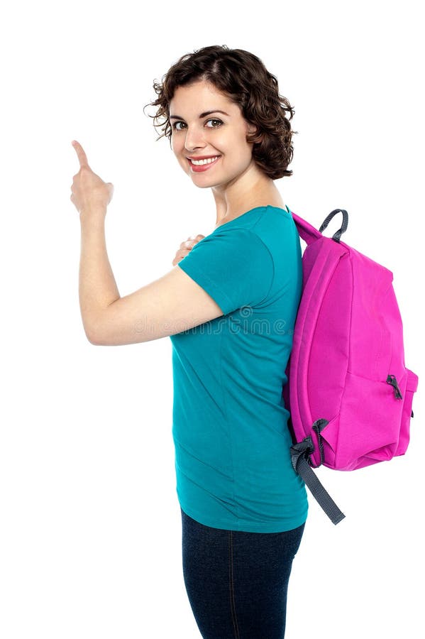 Smiling College Student Pointing Towards the Wall Stock Image - Image ...