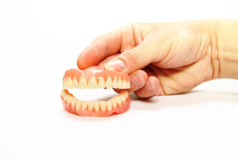 Smiling complete denture stock photo. Image of dental - 13610166