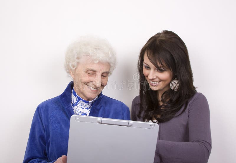 Smiling at Computer stock photo. Image of female, pretty - 8773426