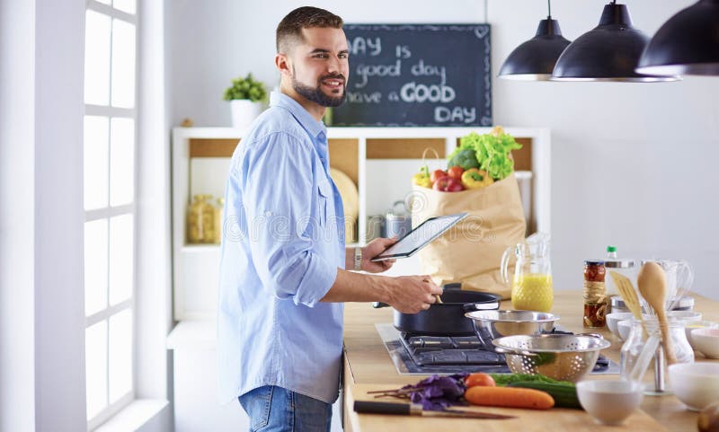 Smiling and Confident Chef Standing in Large Kitchen Stock Image ...