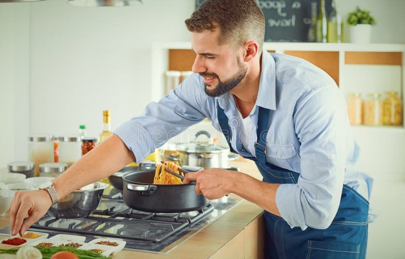 Smiling and Confident Chef Standing in Large Kitchen Stock Image ...