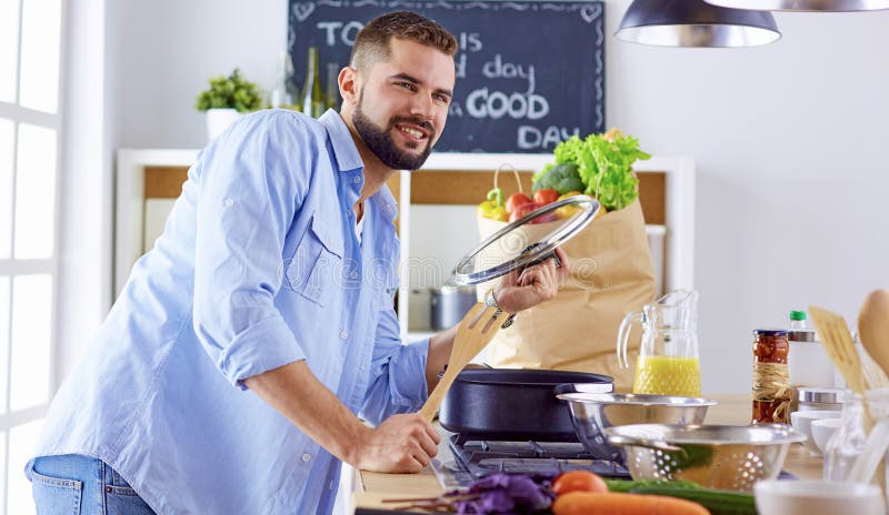 Smiling and Confident Chef Standing in Large Kitchen Stock Image ...