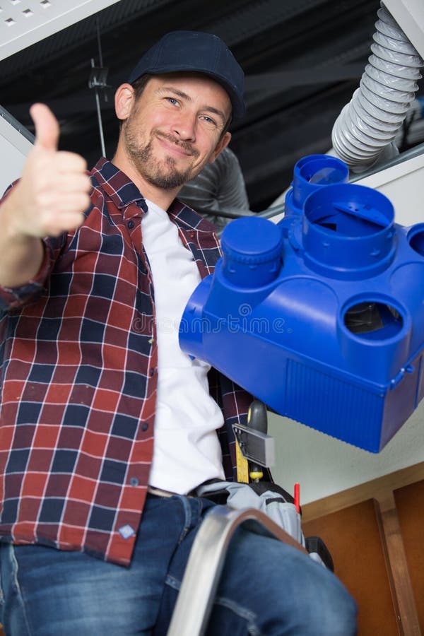Smiling Construction Builder Standing on Ladder with Thumb-up Stock ...