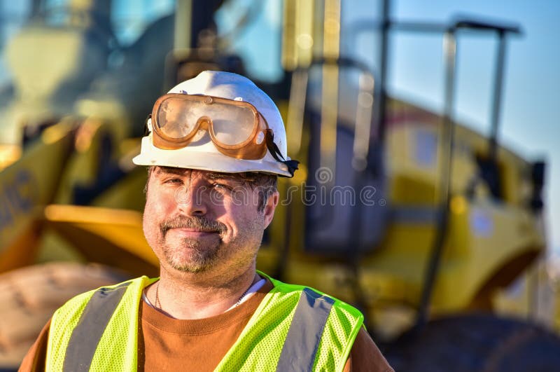 Smiling Construction Worker Stock Image - Image of goatee, machinery ...