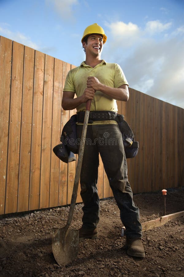 Smiling Construction Worker with a Shovel Stock Image - Image of short ...