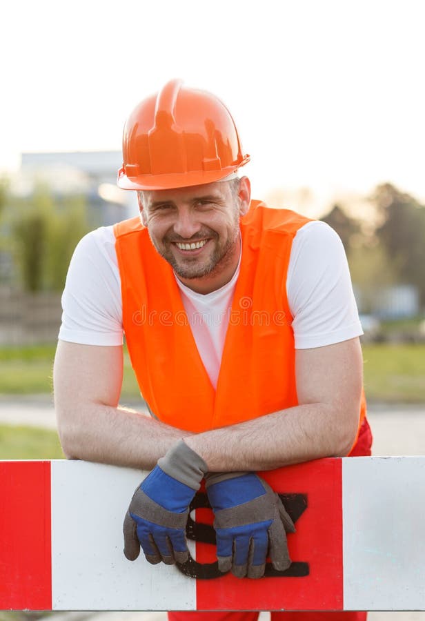 Smiling Construction Worker Stock Image - Image of protective, outside ...