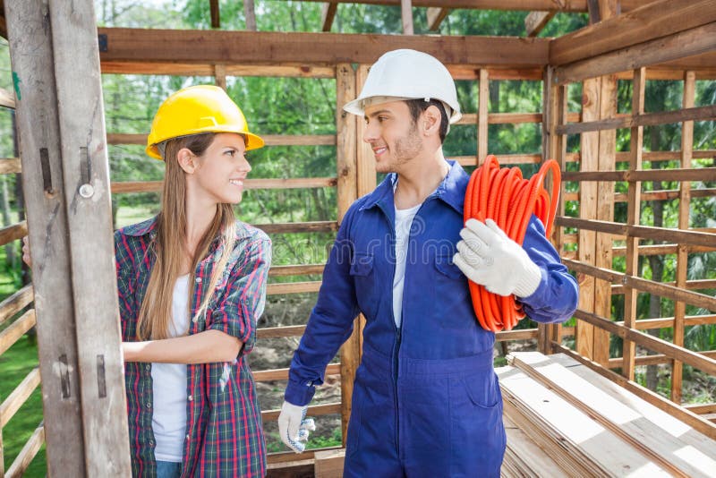 Smiling Construction Workers at Site Stock Photo - Image of carpenter ...