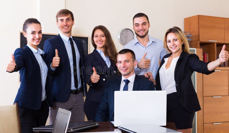 Smiling Corporate Managers in Office Interior Stock Image - Image of ...