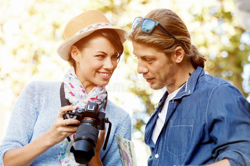 Smiling Couple with the Camera Stock Image - Image of camera, playful ...