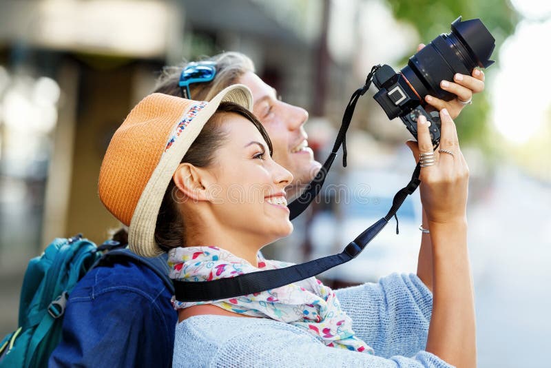 Smiling Couple with the Camera Stock Image - Image of sunglasses ...