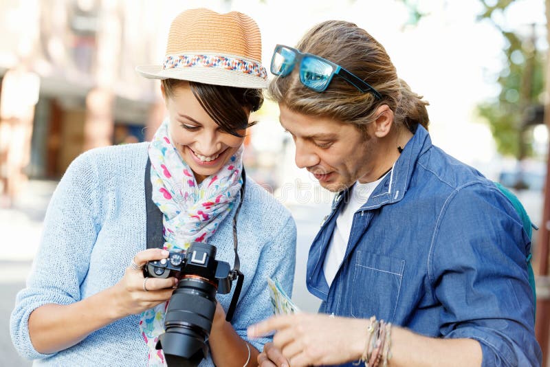 Smiling Couple with the Camera Stock Photo - Image of landmarks ...