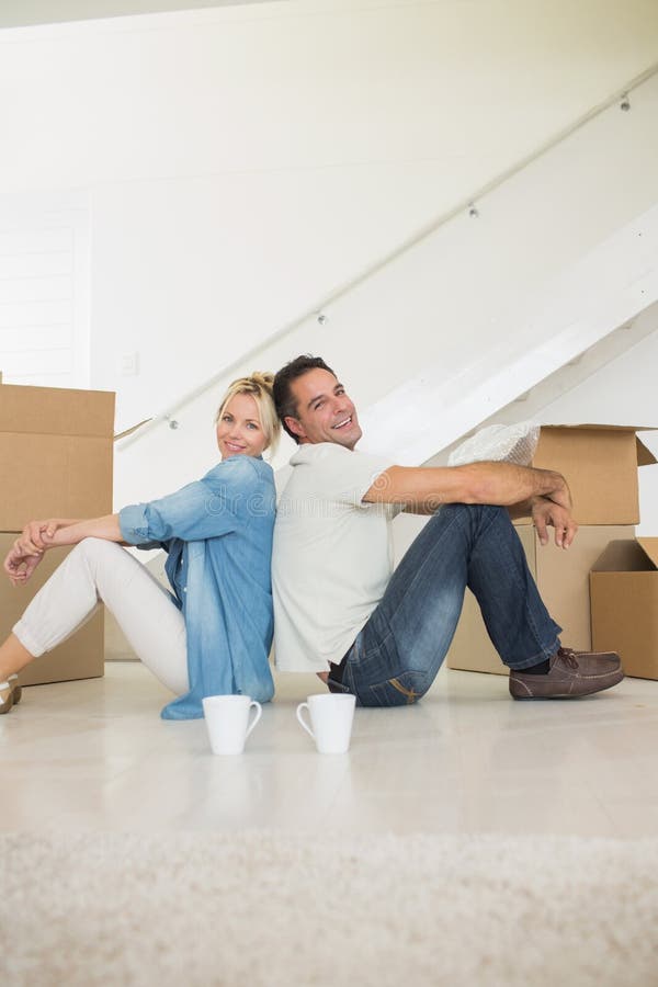 Couple with moving boxes. stock photo. Image of full, handsome - 6153484