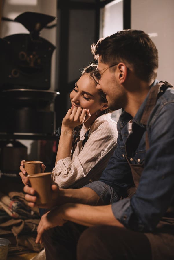Smiling Couple with Cups of Coffee Having Break during Work Stock Image ...