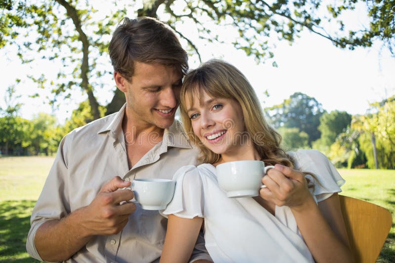 Smiling Couple Having Tea Outside in a Cafe Stock Image - Image of ...