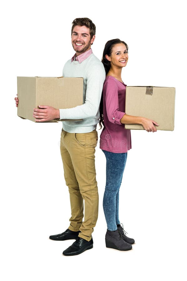 Smiling Couple Holding Boxes Stock Photo - Image of adult, casual: 65344996