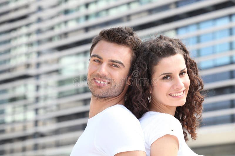 Smiling couple outdoors stock photo. Image of young, years - 18171686