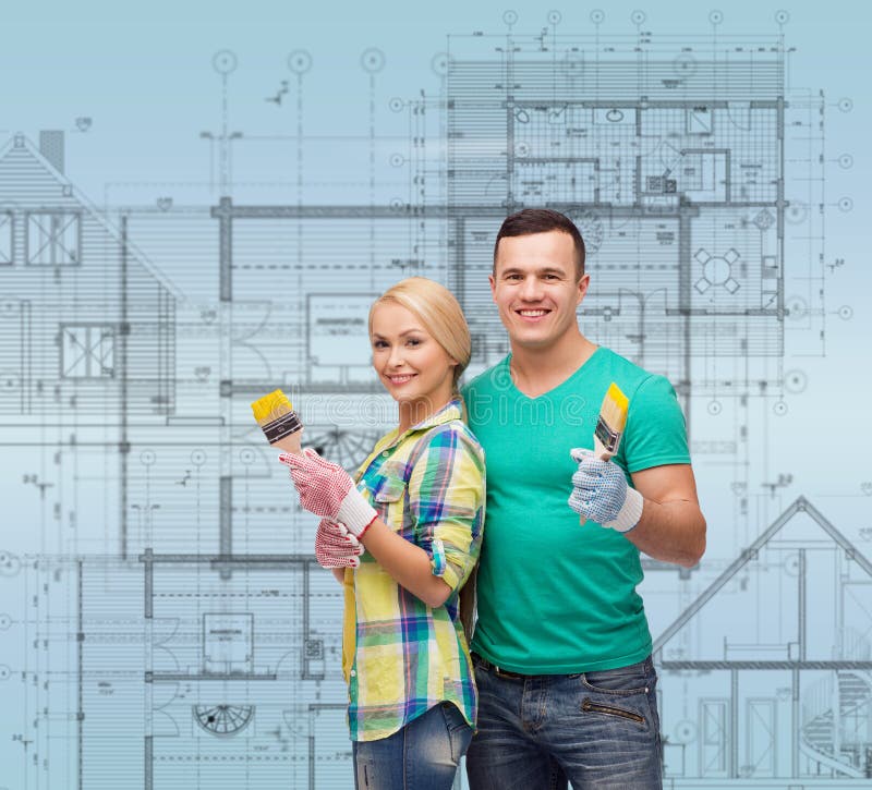 Smiling Couple with Paintbrush Stock Photo - Image of instrument ...