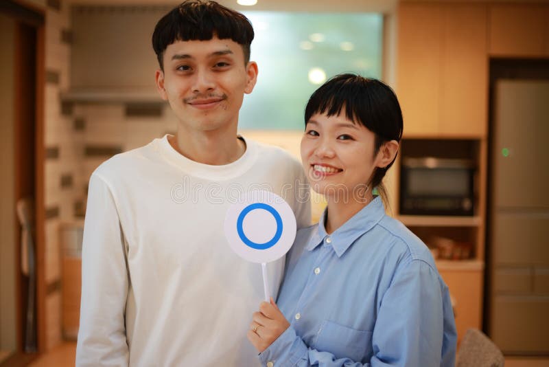 A Smiling Couple with a Round Bill Stock Image - Image of person ...