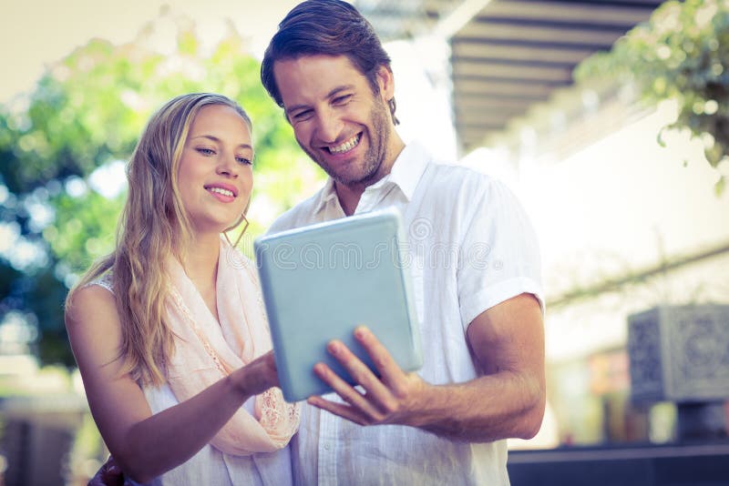 Smiling Couple Using Tablet Computer Stock Image - Image of happy ...