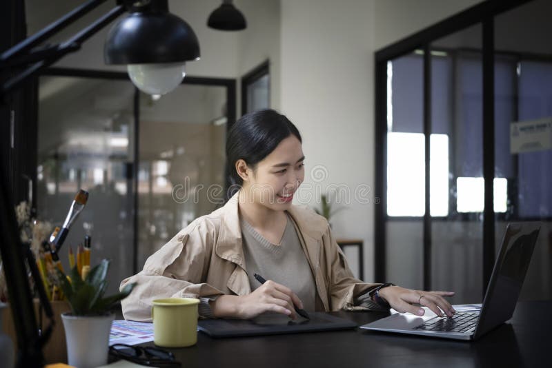 Creative Designer Working with Laptop Computer at Workplace. Stock ...