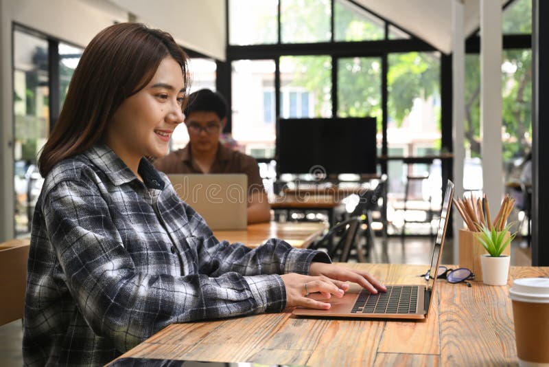 Creative Woman Working with Laptop in Office. Stock Photo - Image of ...