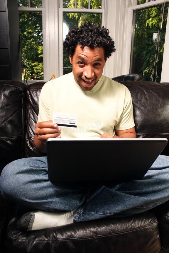 Smiling with Credit Card stock image. Image of credit - 9935199