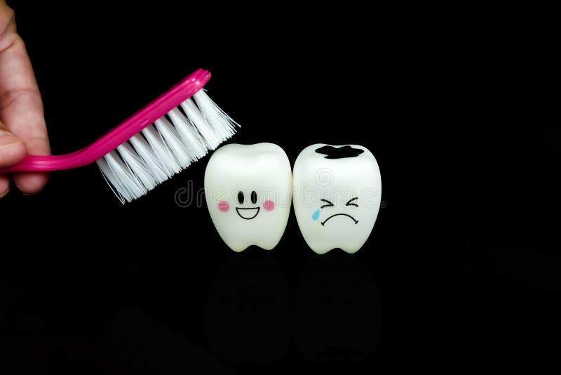 Smiling and cry teeth toy stock photo. Image of glass - 59625990