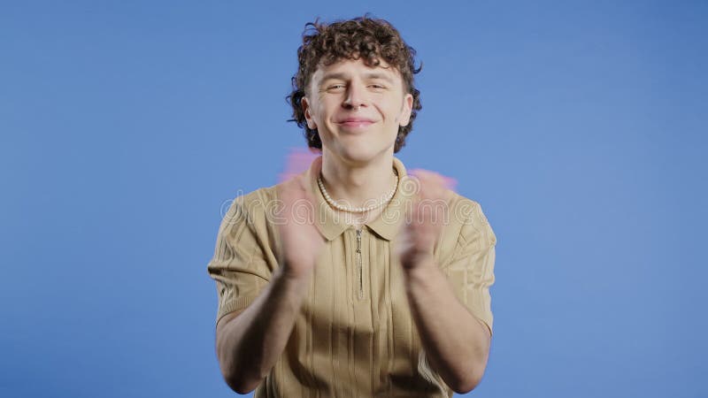 Smiling Curly Man Claps Hands, Congratulating. Support,Cheering ... Smiling Curly Man Claps Hands, Congratulating. Support,Cheering ...