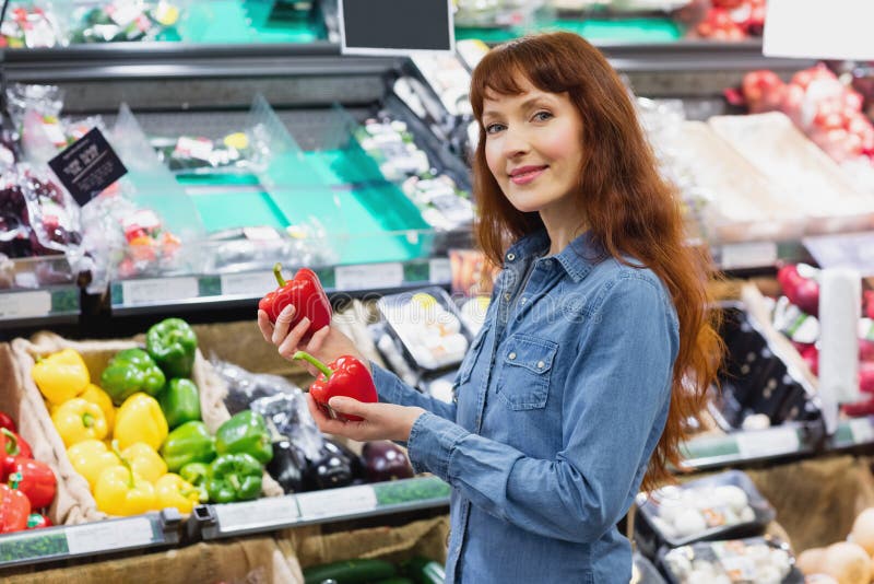 Smiling Customer Holding Peppers Stock Photo - Image of sale, adult ...