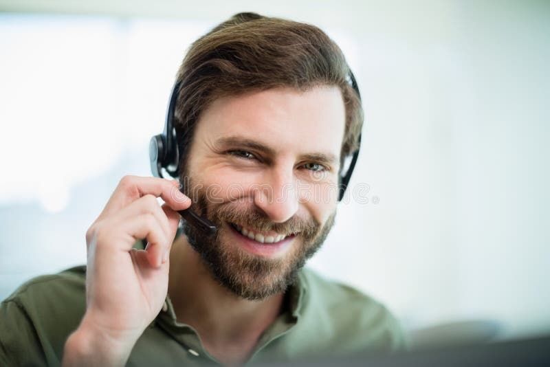 Smiling Customer Service Executive Working in Call Center Stock Photo ...