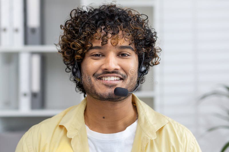 Smiling Customer Service Representative with Headset Looking at the ...
