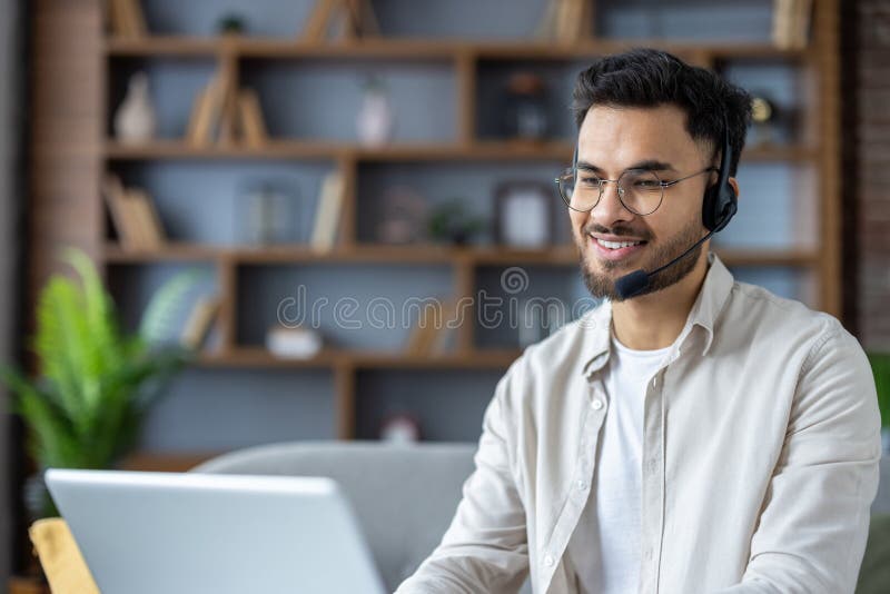 Smiling Customer Service Representative Working Remotely with Headset ...