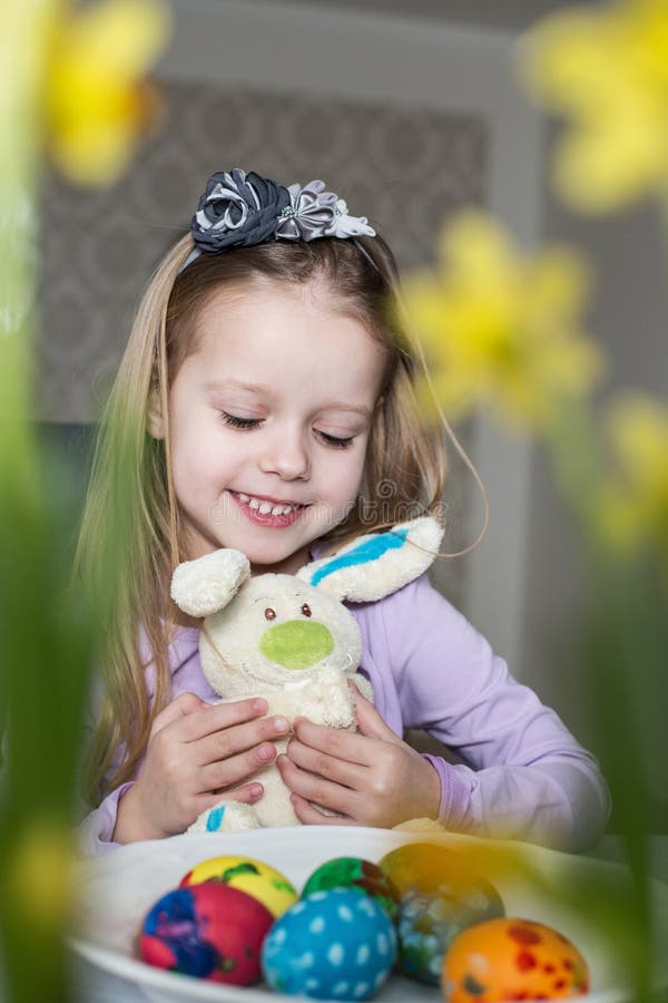 Smiling Cute Kid with Easter Eggs and Plush Bunny. Easter Stock Image ...