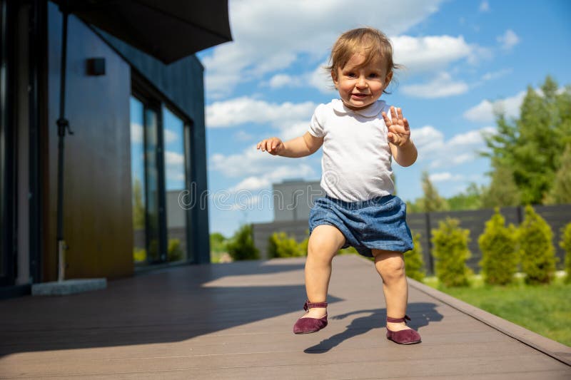 Smiling Cute Kid Walking and Looking Excited Stock Photo - Image of ...