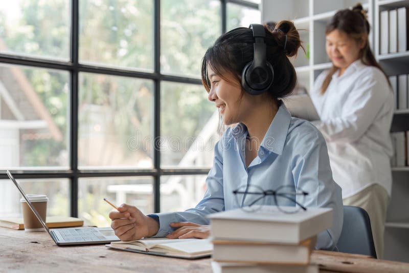 Smiling Cute Stylish Female Student, Studying Remotely from Library ...
