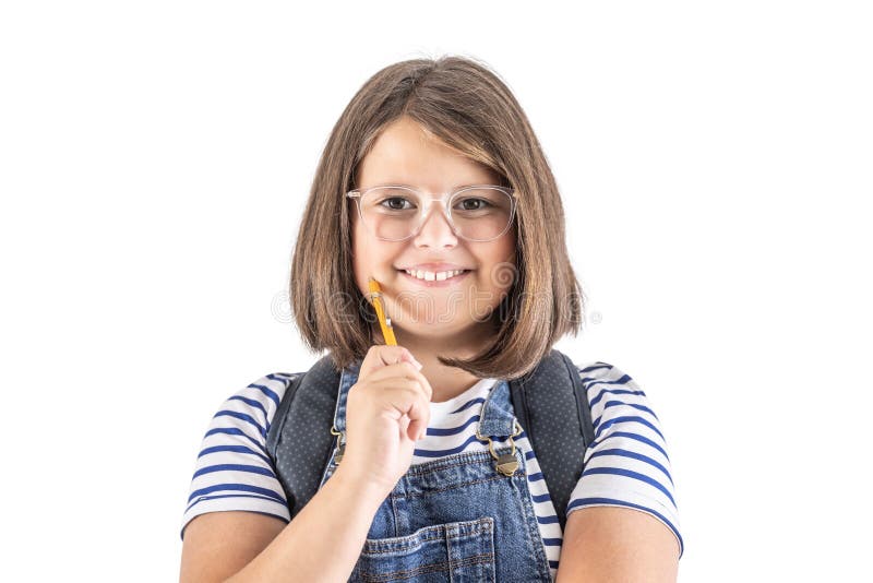 Smiling Cute Young Schoolgirl In Glasses Holds Pencil Close To Her