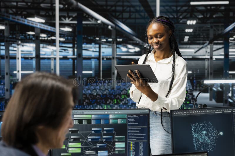 Smiling Data Center Software Developer Using Tablet, Coding, Managing ...