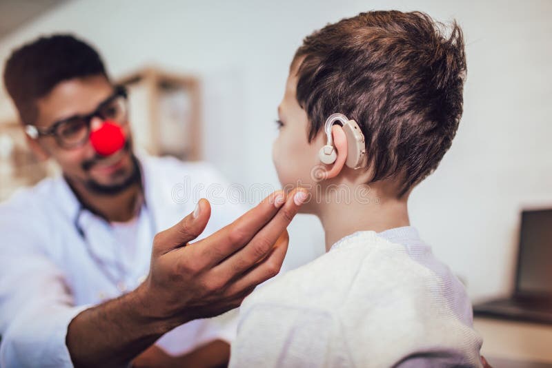 Deaf Boy with Ear Implant at Doctor`s Office Stock Photo - Image of ...