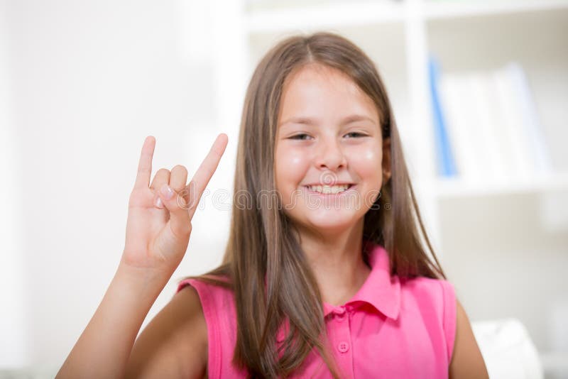 Smiling Deaf Girl Using Sign Language Stock Photo - Image of child ...
