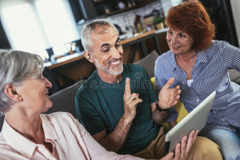 Deaf Man with His Friends Talking Using Sign Language on the Tablets`s ...