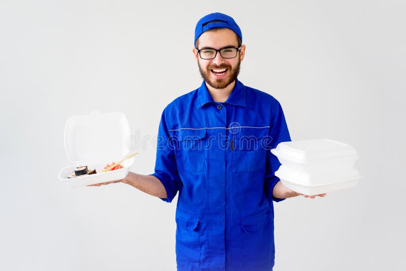 Smiling delivery guy stock photo. Image of chopsticks - 97872892