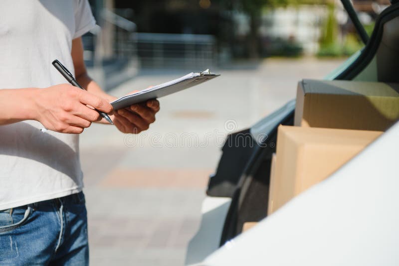 Smiling Delivery Man Standing in Front of His Van Stock Image - Image ...