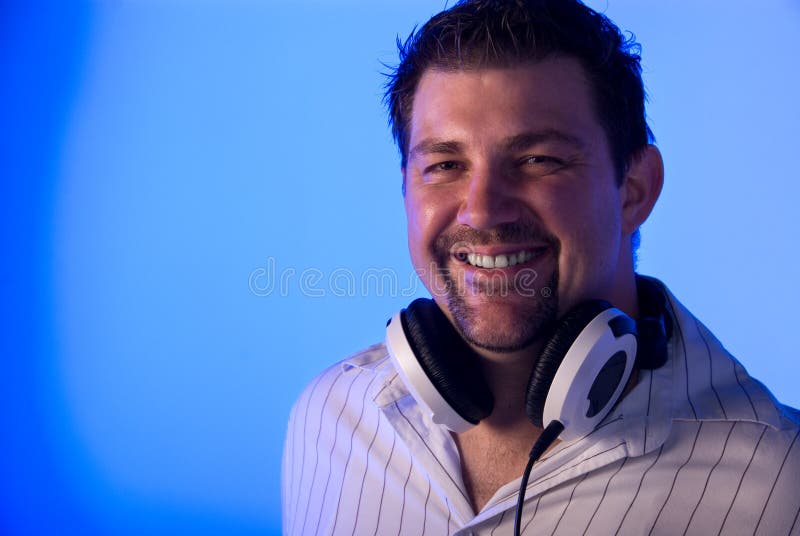Smiling DJ stock photo. Image of disco, audio, headphones - 7538186