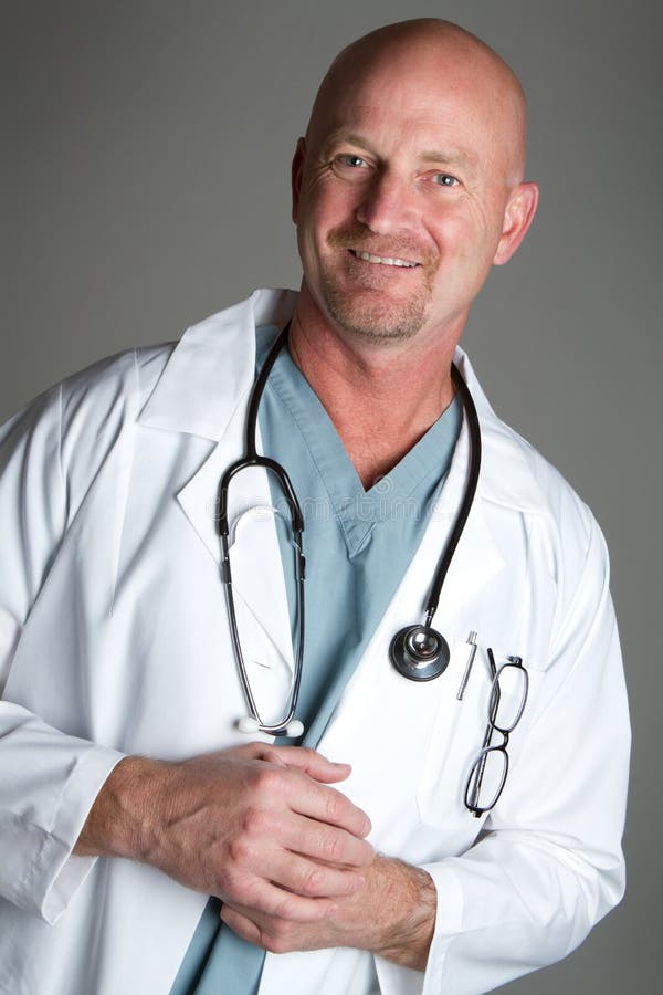 Smiling Doctor stock image. Image of people, nurse, coat - 14030157