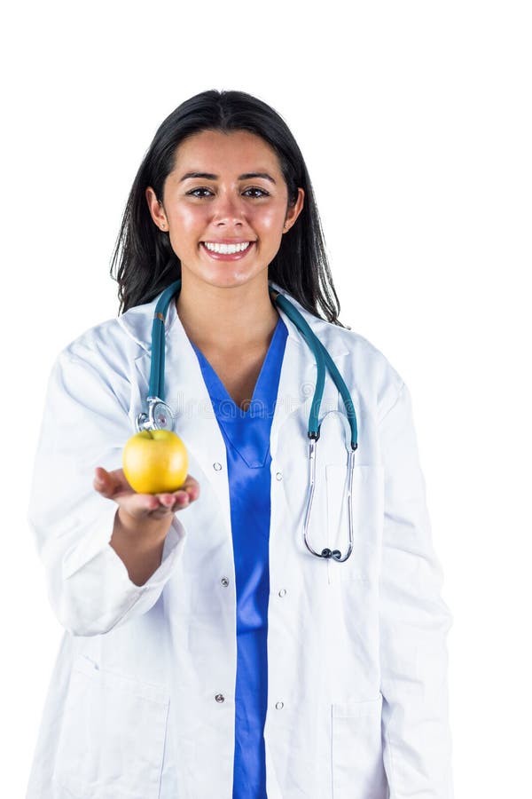 Smiling Doctor with an Apple in Her Hand Stock Photo - Image of hair ...
