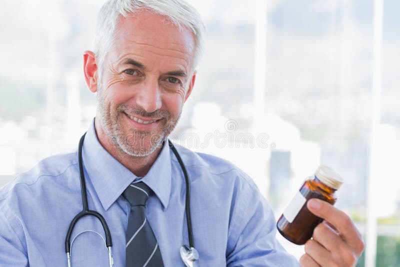 641 Male Doctor Holding Jar Stock Photos - Free & Royalty-Free Stock ...