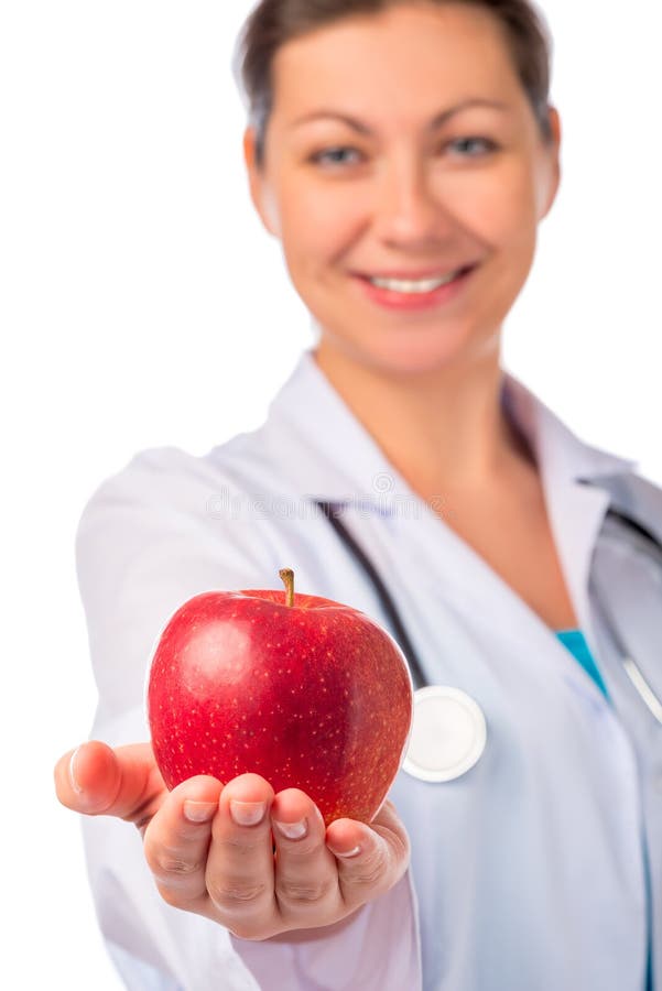 Smiling Doctor Holding a Red Apple Stock Image - Image of hand ...