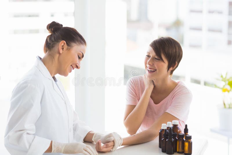 Smiling doctor and patient stock photo. Image of care - 77700996