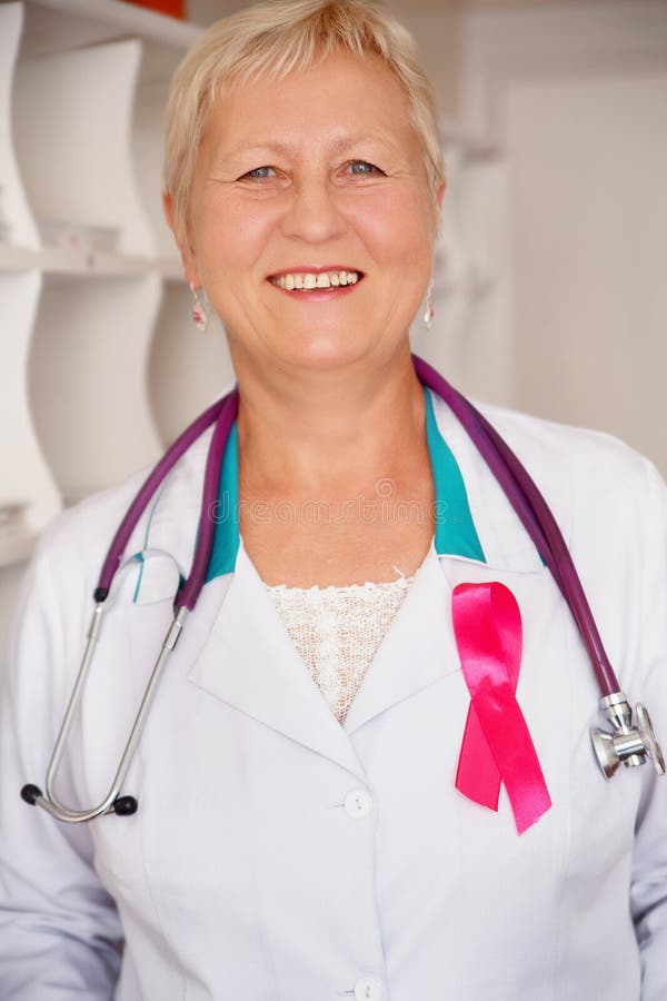 Smiling Doctor with Stethoscope Stock Photo - Image of white, pink ...