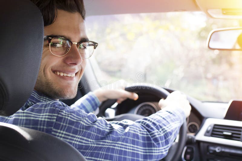 Smiling driving stock image. Image of teenager, grip - 135189323